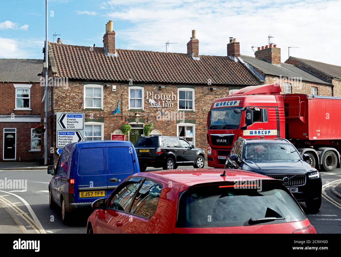 Traffic at mini roundabout in Snaith, East Yorkshire, England UK Stock ...