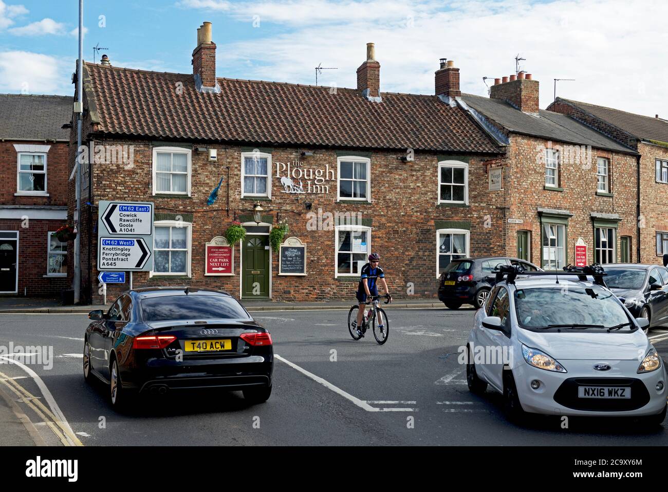 Traffic at mini roundabout in Snaith, East Yorkshire, England UK Stock ...