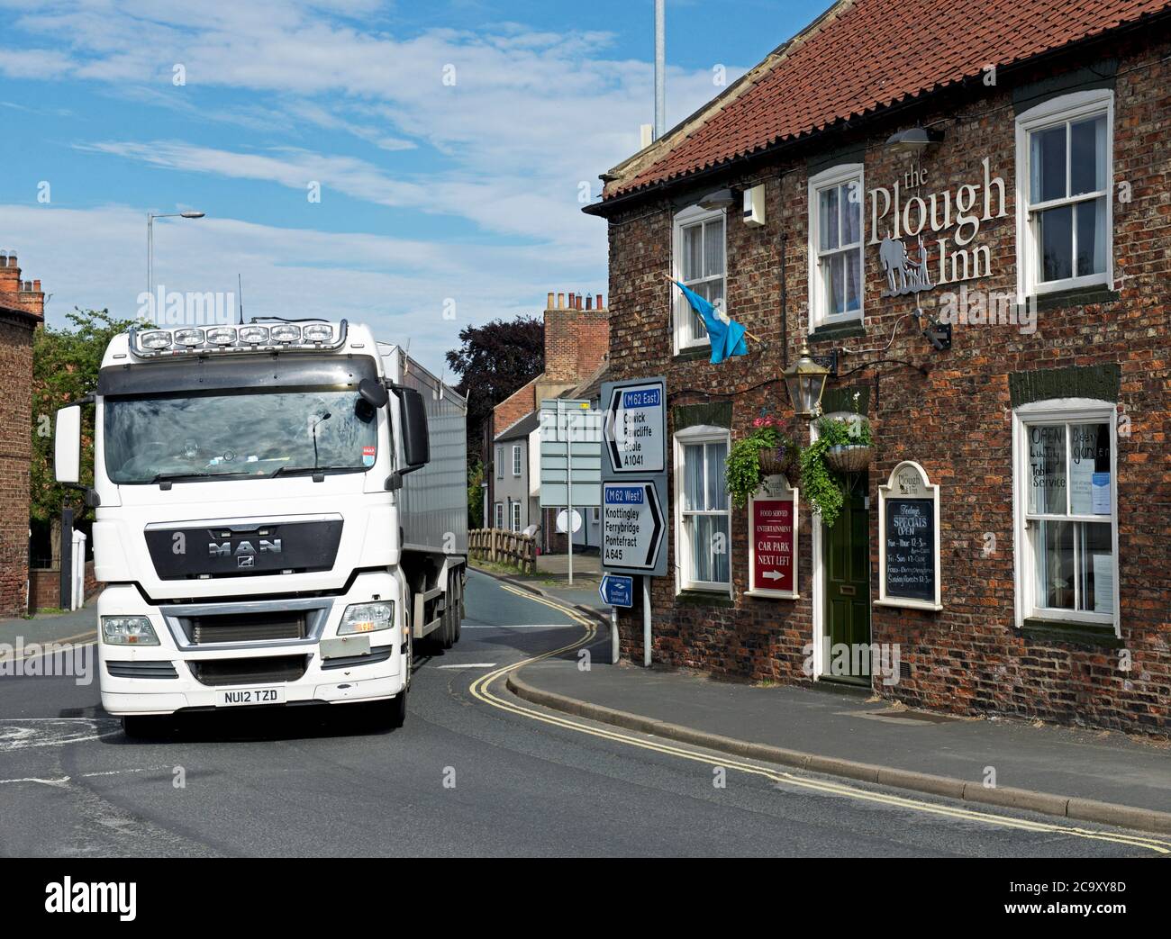Traffic at mini roundabout in Snaith, East Yorkshire, England UK Stock ...