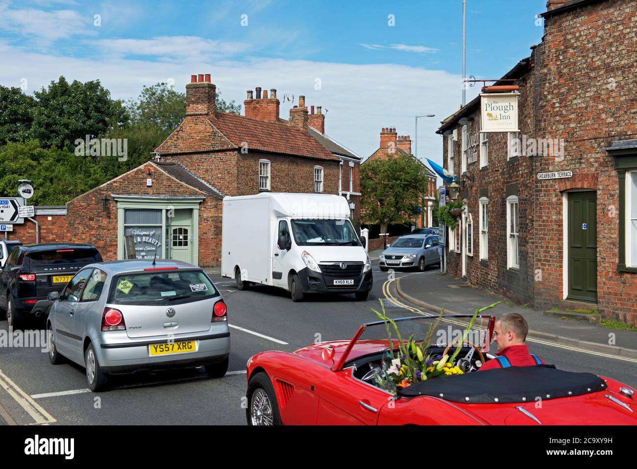 Traffic at mini roundabout in Snaith, East Yorkshire, England UK Stock ...