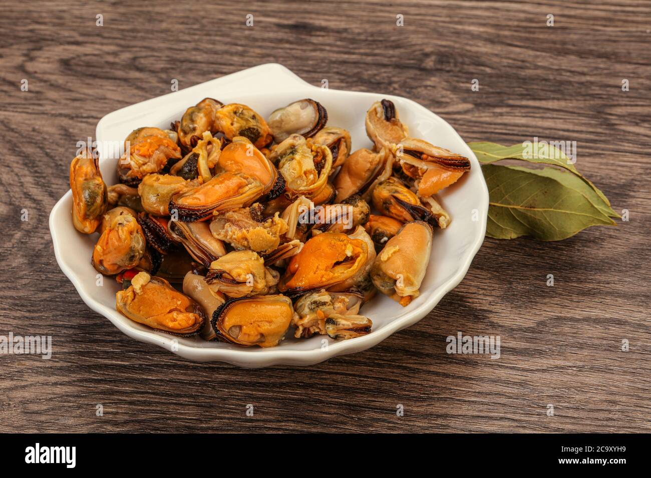 Pickled mussels with spices in the bowl Stock Photo - Alamy