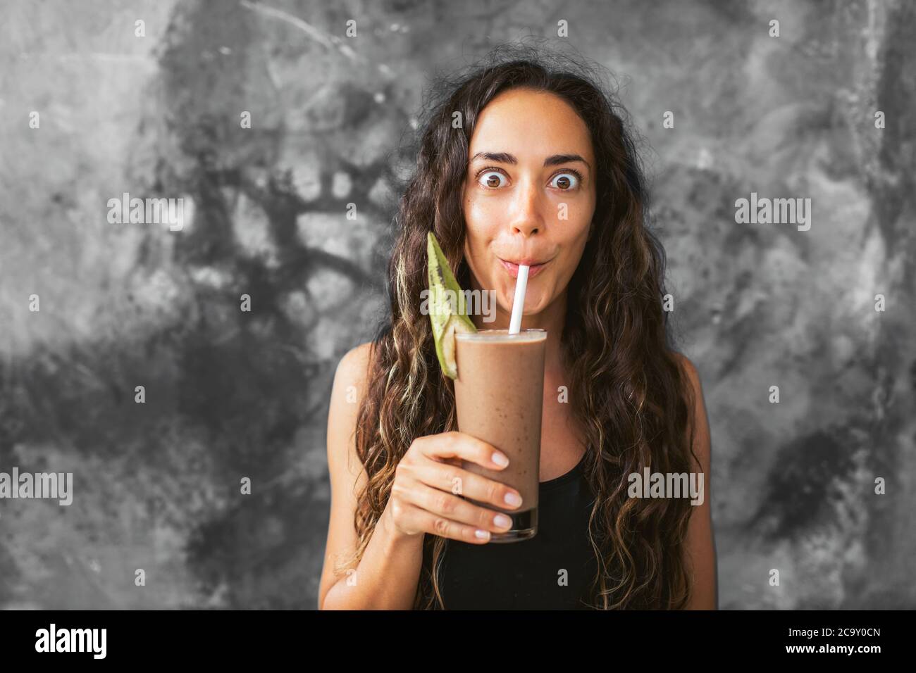 Girl Drinking Chocolate Milkshake High Resolution Stock Photography and ...