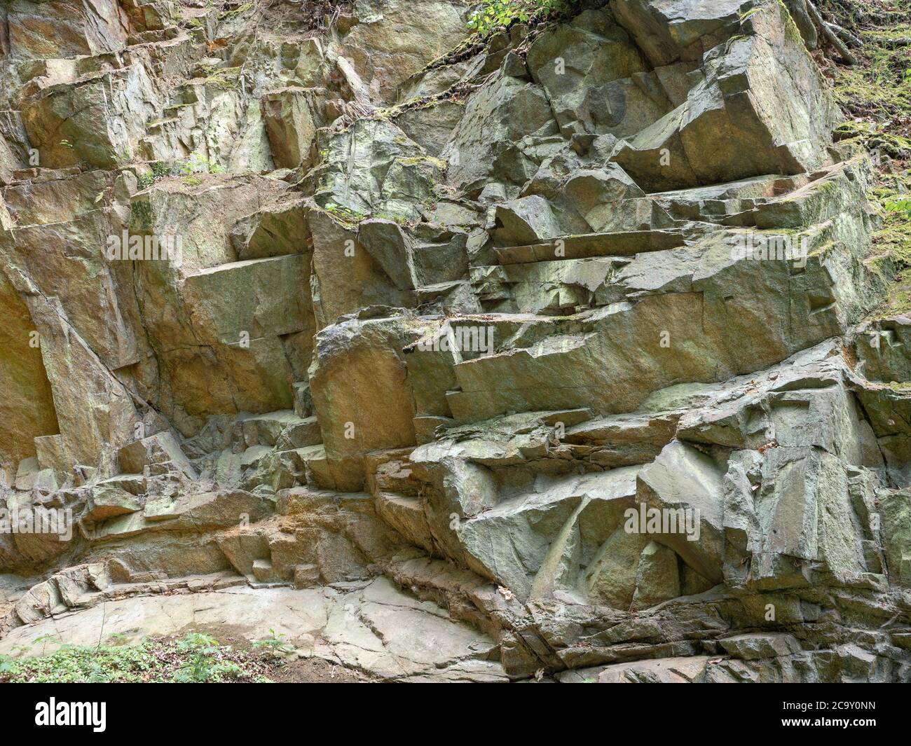 Natural variegated rocks of sandstone. Details of stone texture ...