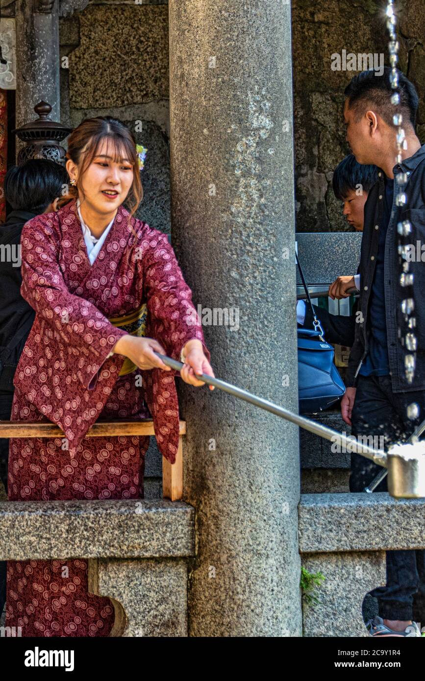 Japanese woman praying in temple hi-res stock photography and images ...