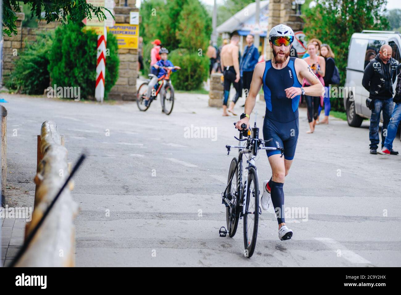 KHARKIV, UKRAINE - August 2, 2020: Triathon biking cyclist triathlete ...