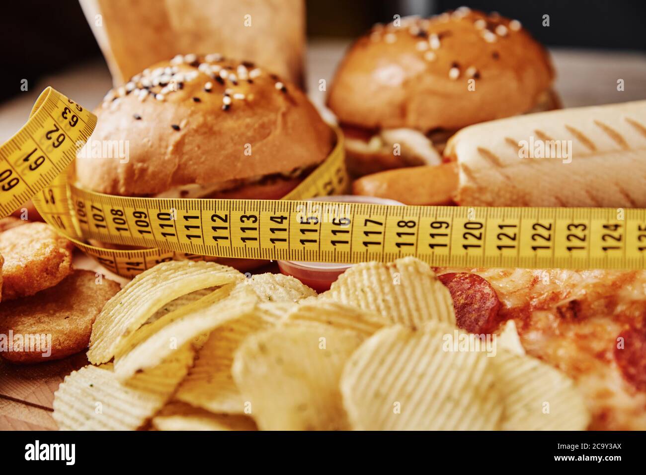 Unhealthy and junk food. Different types of fastfood and snacks on ...