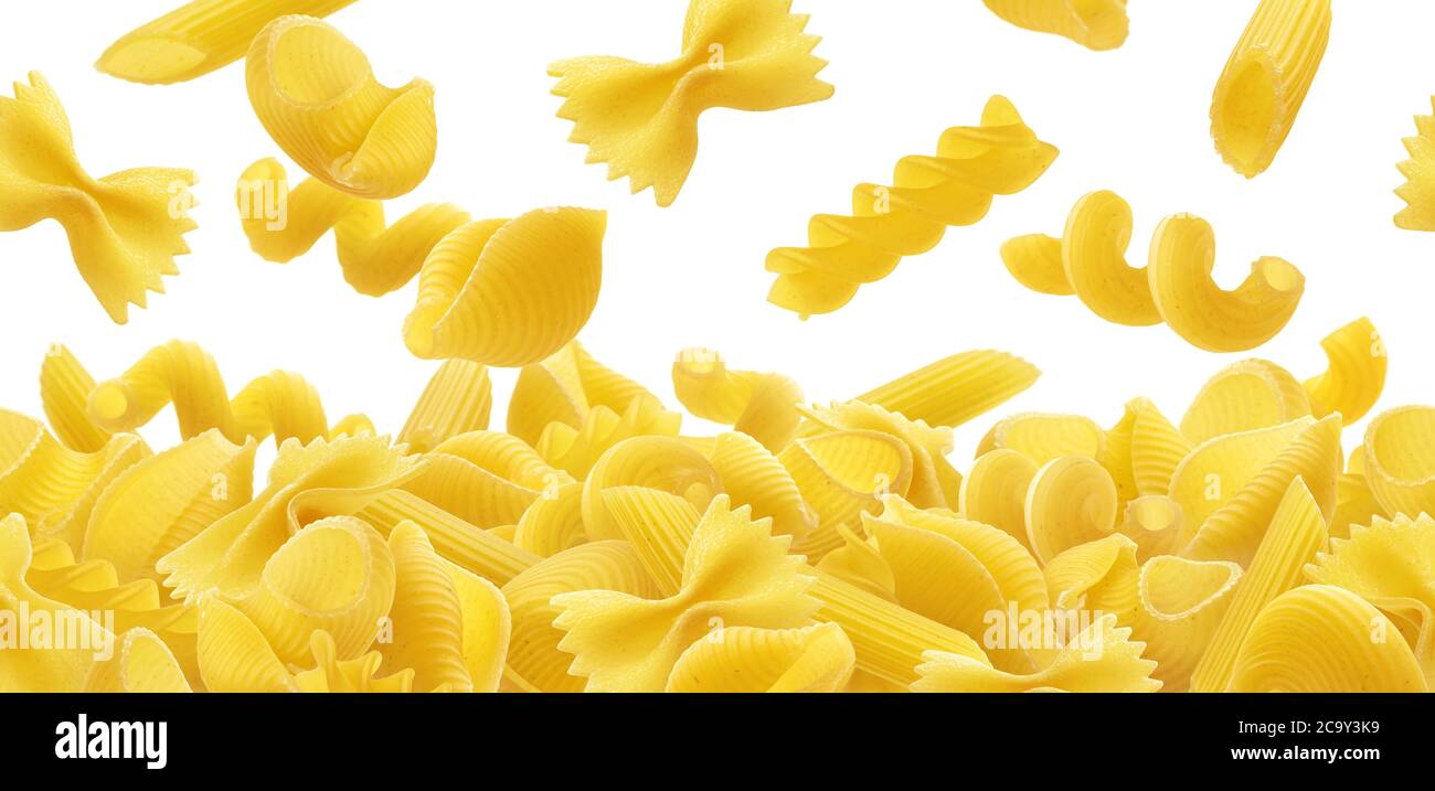 Pasta border, different raw pasta types falling over white background ...
