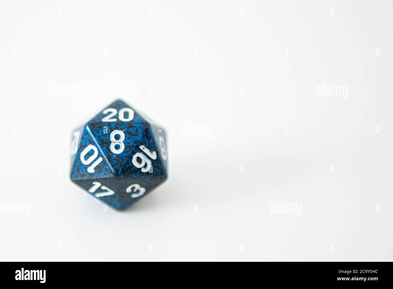 A nat 20 is rolled on a 20 sided dice used for agmes of Dungeons ...