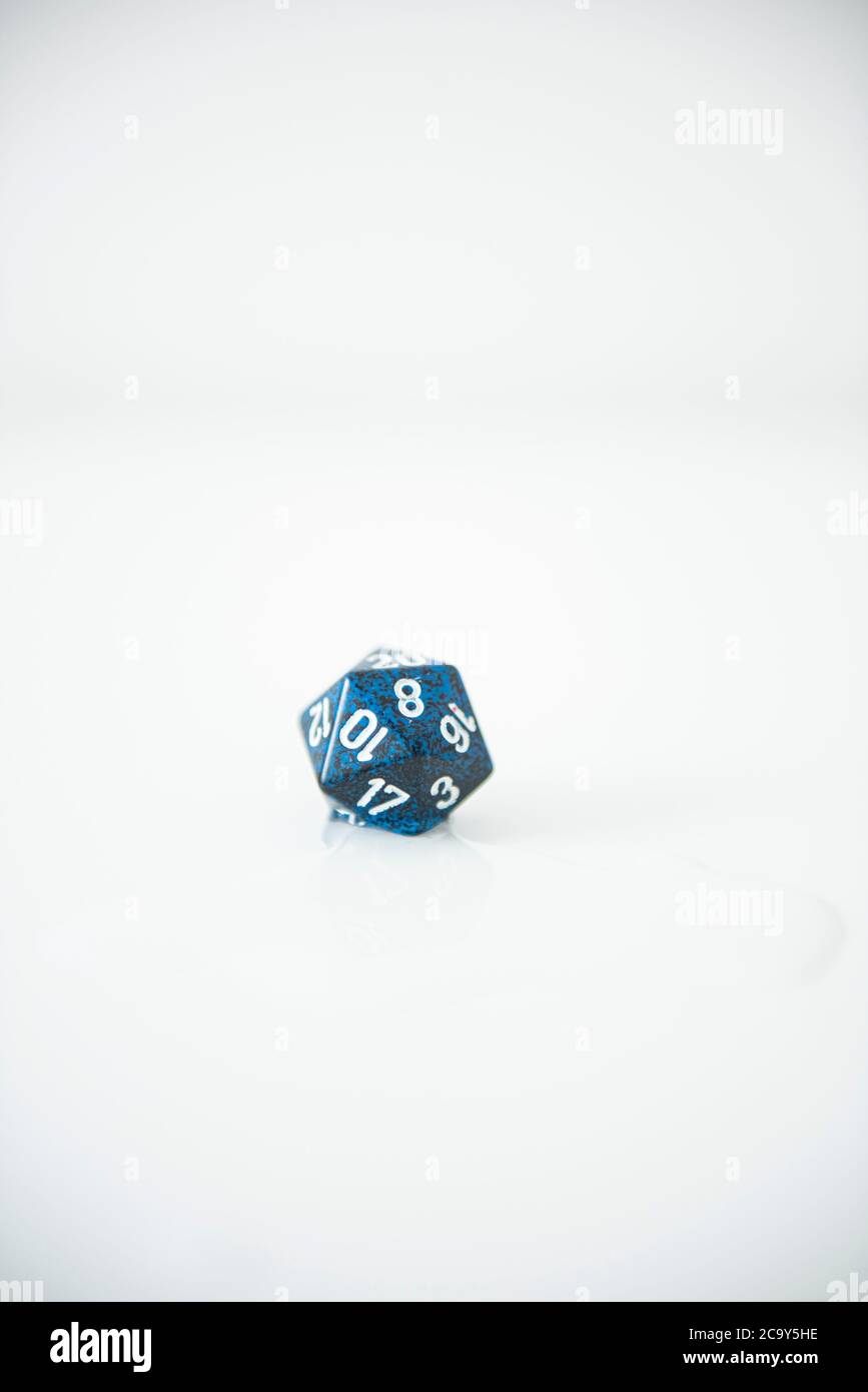 A nat 20 is rolled on a 20 sided dice used for agmes of Dungeons ...