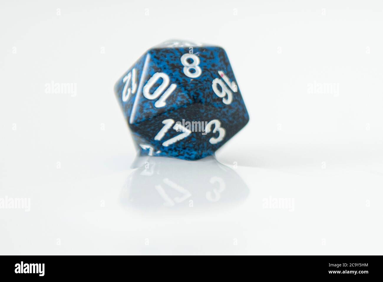 A nat 20 is rolled on a 20 sided dice used for agmes of Dungeons ...