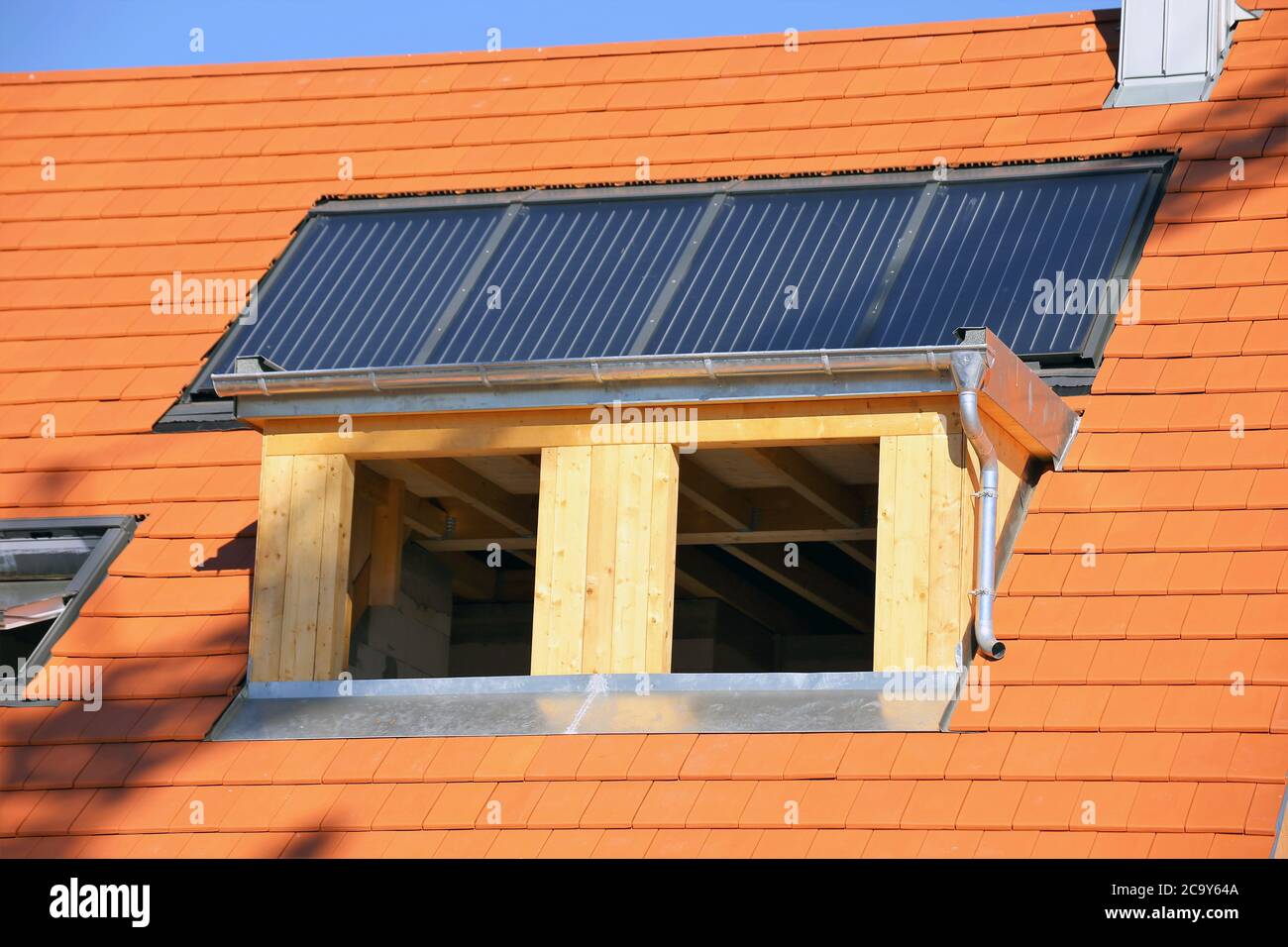 New roof with dormer under construction Stock Photo - Alamy