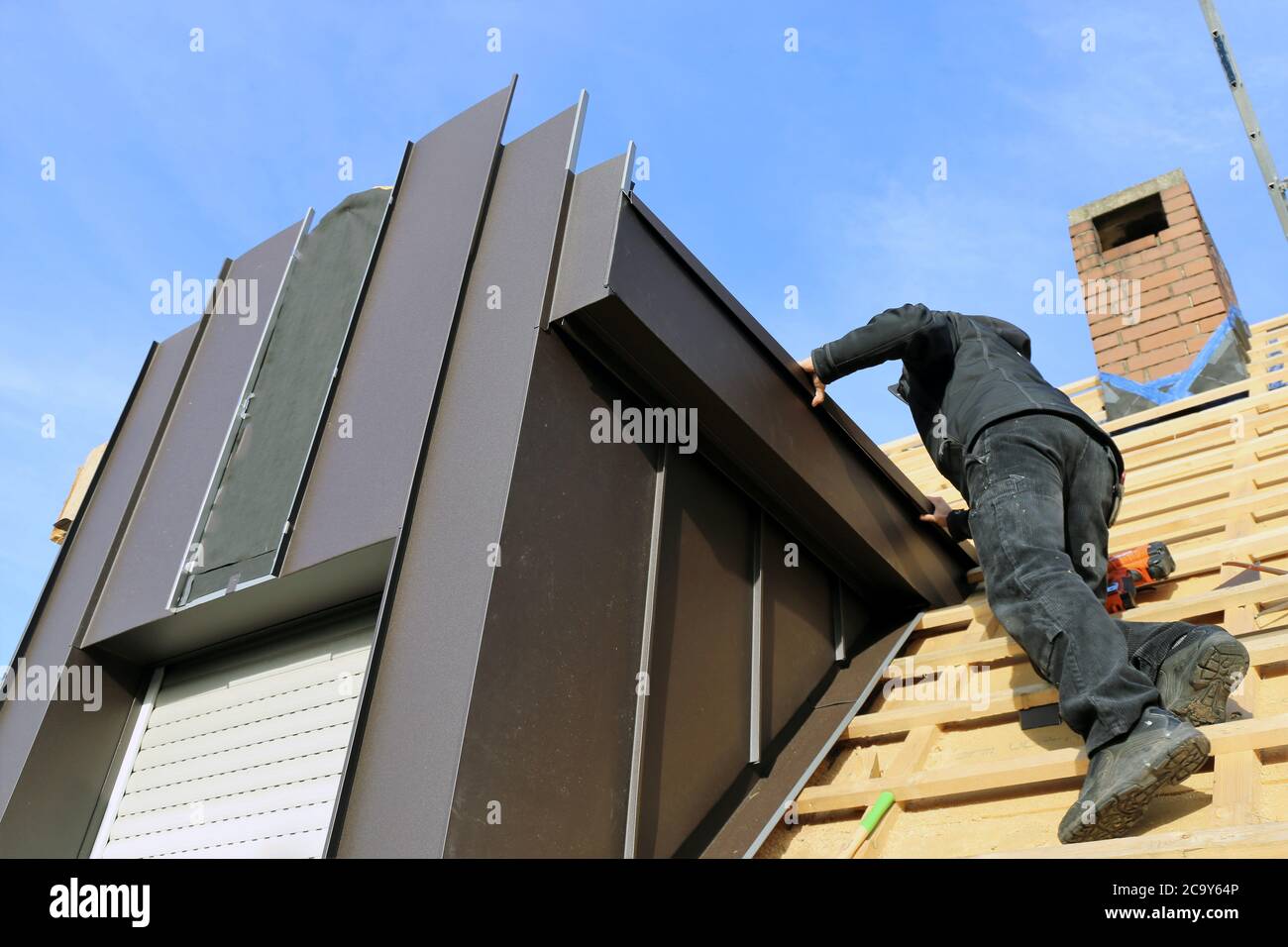 New roof with dormer under construction Stock Photo - Alamy