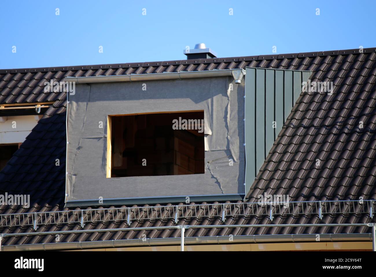 New roof with dormer under construction Stock Photo - Alamy