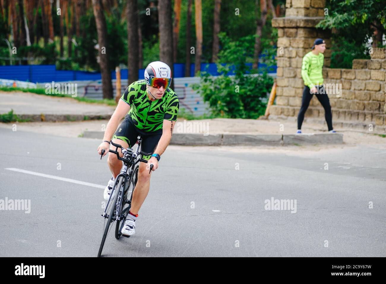 KHARKIV, UKRAINE - August 2, 2020: Triathon biking cyclist triathlete ...