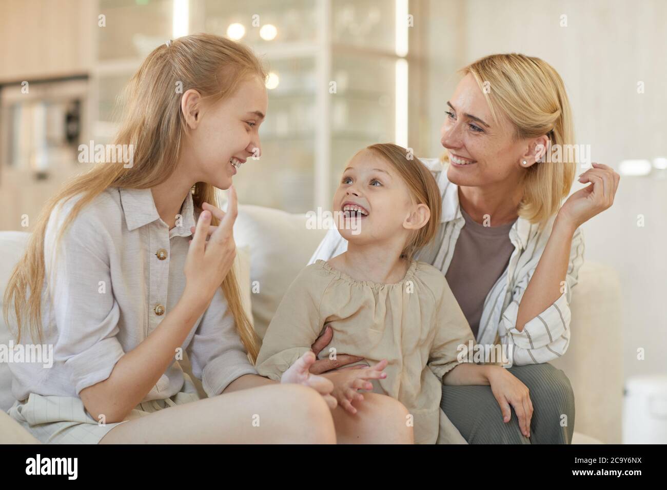 Two mothers talking children hi-res stock photography and images - Alamy