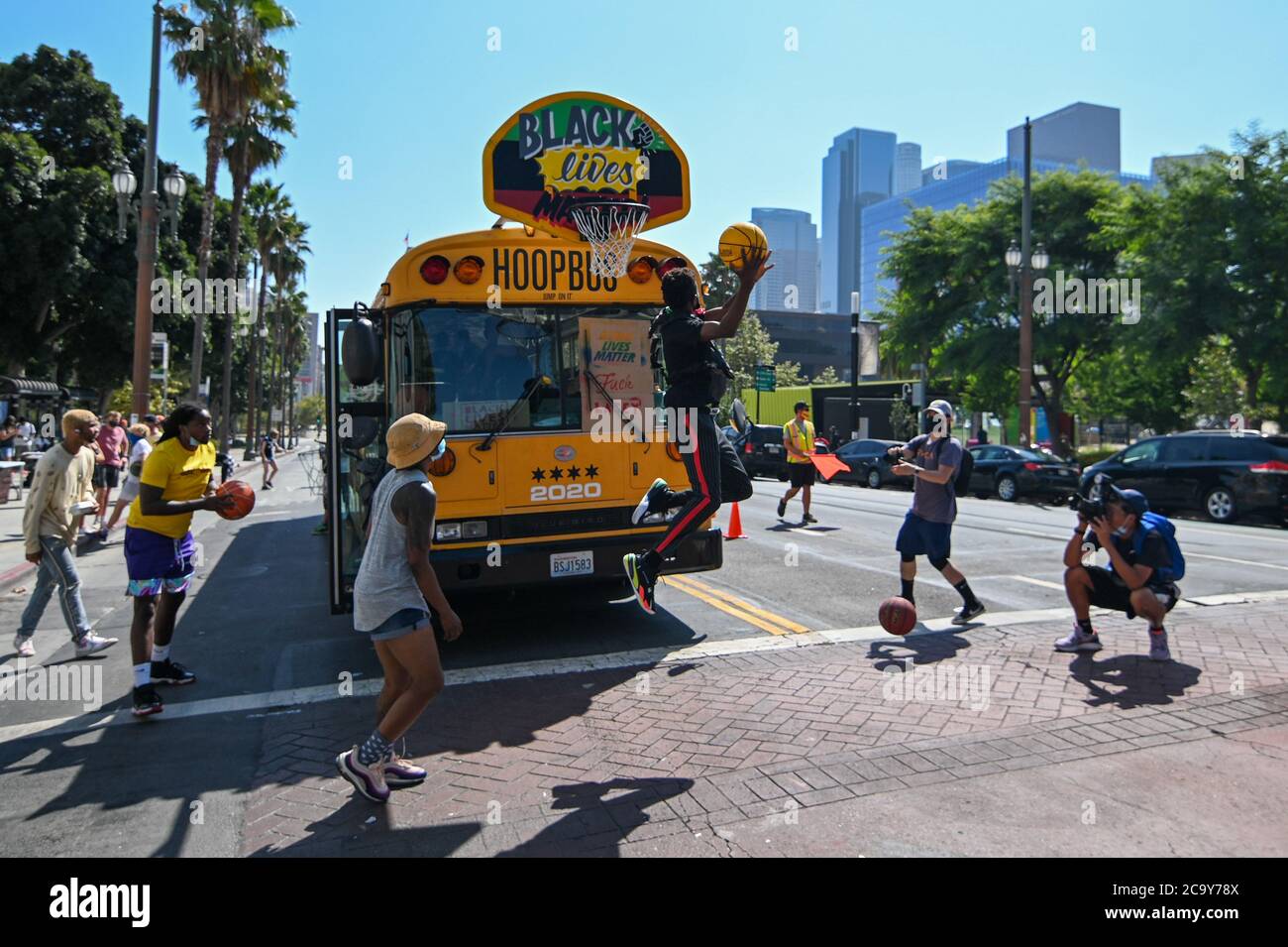 Los Angeles, United States. 02nd Aug, 2020. A man dunks the a ball at ...