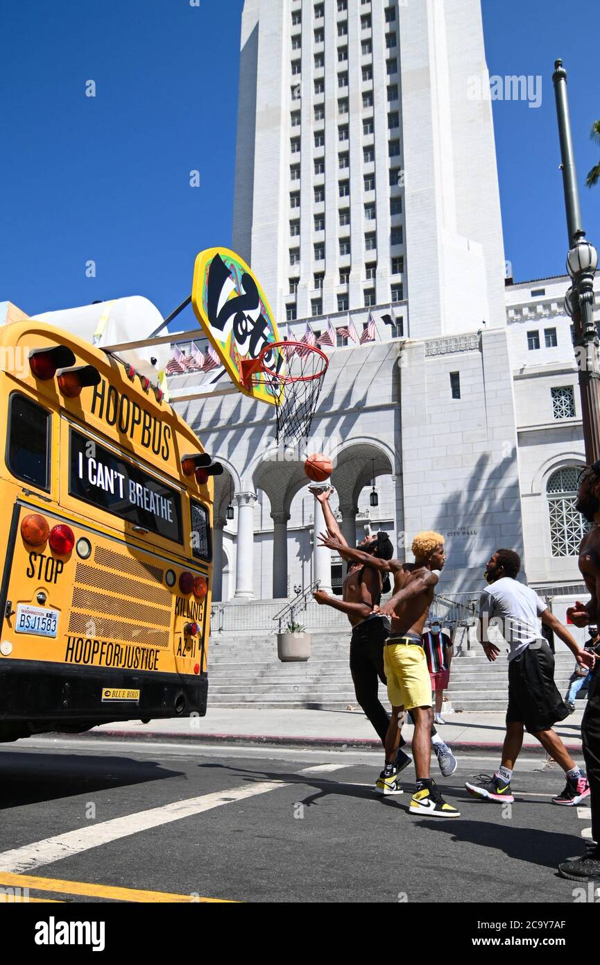 Los Angeles, United States. 02nd Aug, 2020. A man dunks the a ball at ...