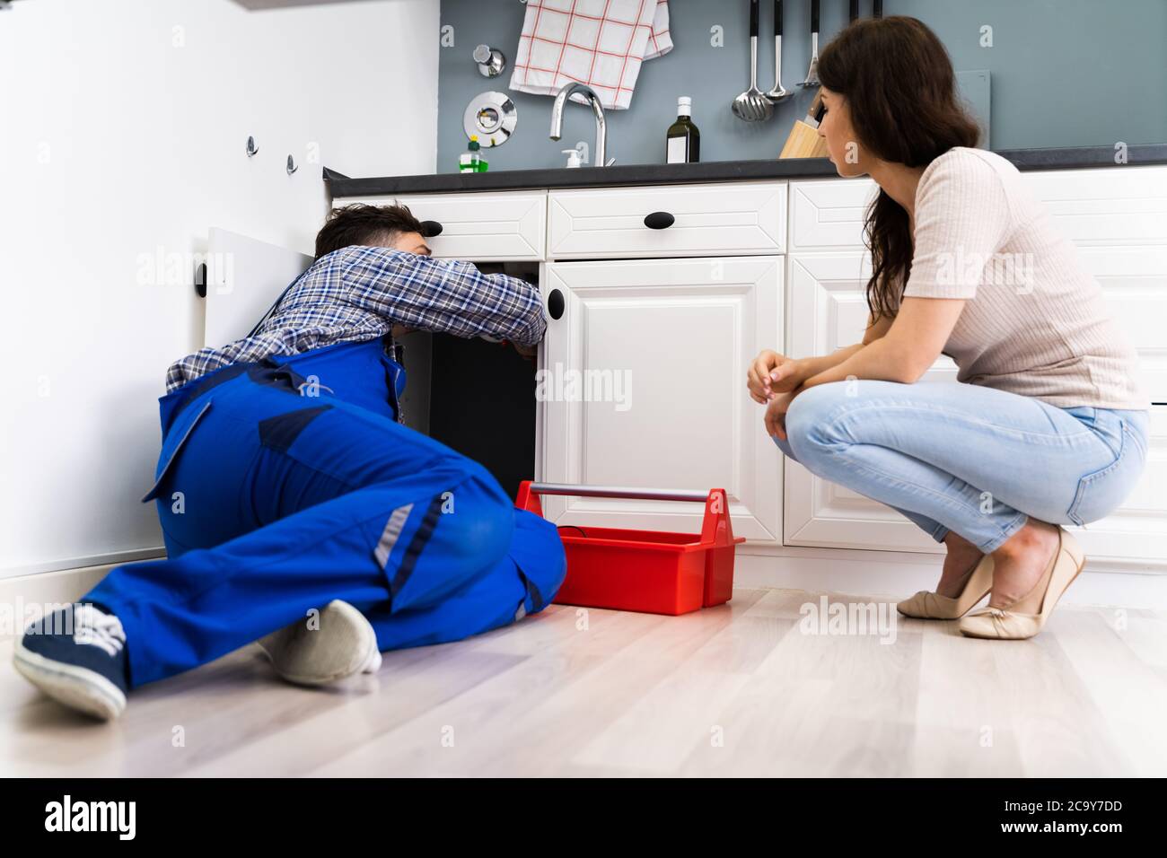 Female plumber pipe hi-res stock photography and images - Alamy