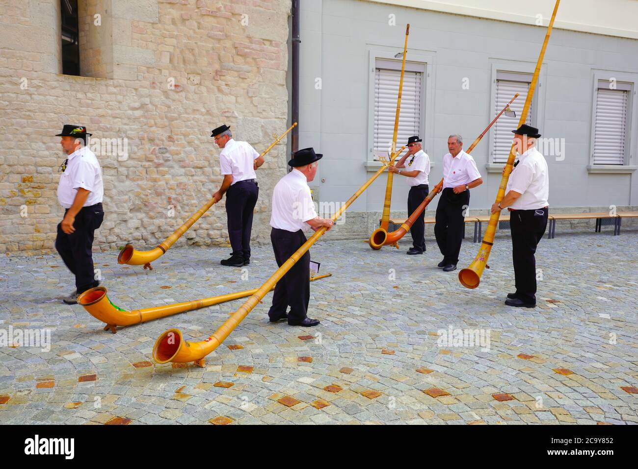 Swiss alphorn players prepare to give a concert on Swiss National Day ...