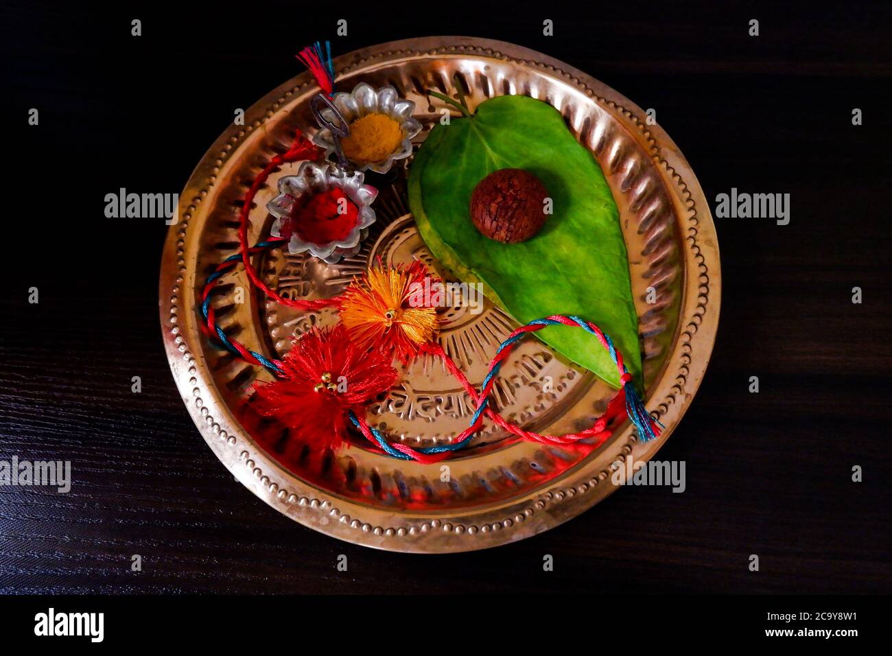 a top view of designed raksha bandhan in colorful threads isolated on ...