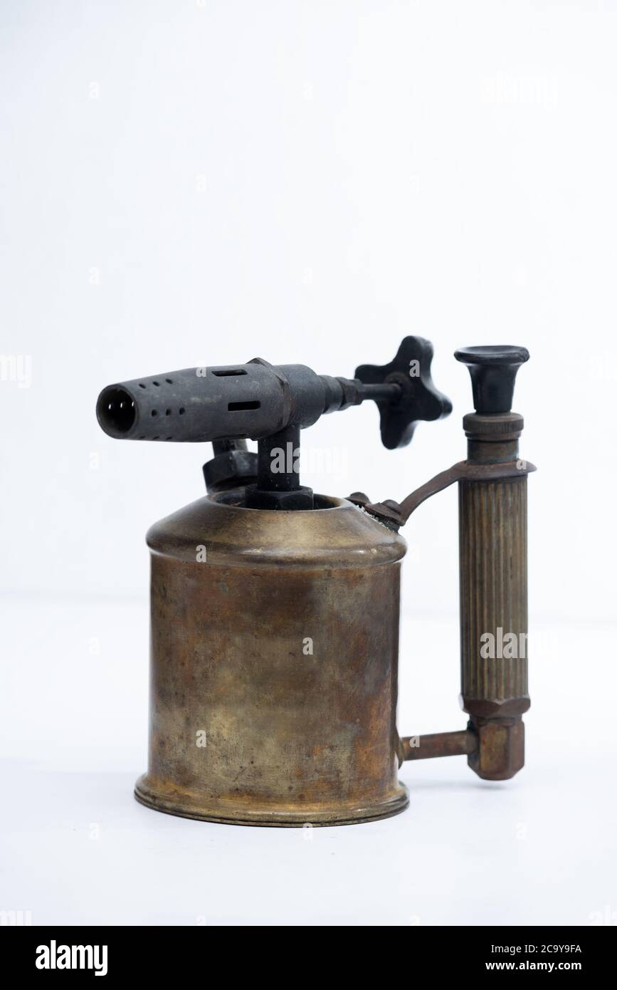 Vintage steel blowtorch on the white background Stock Photo - Alamy