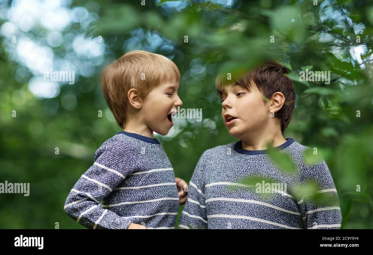 Two Sad Boys Hugging