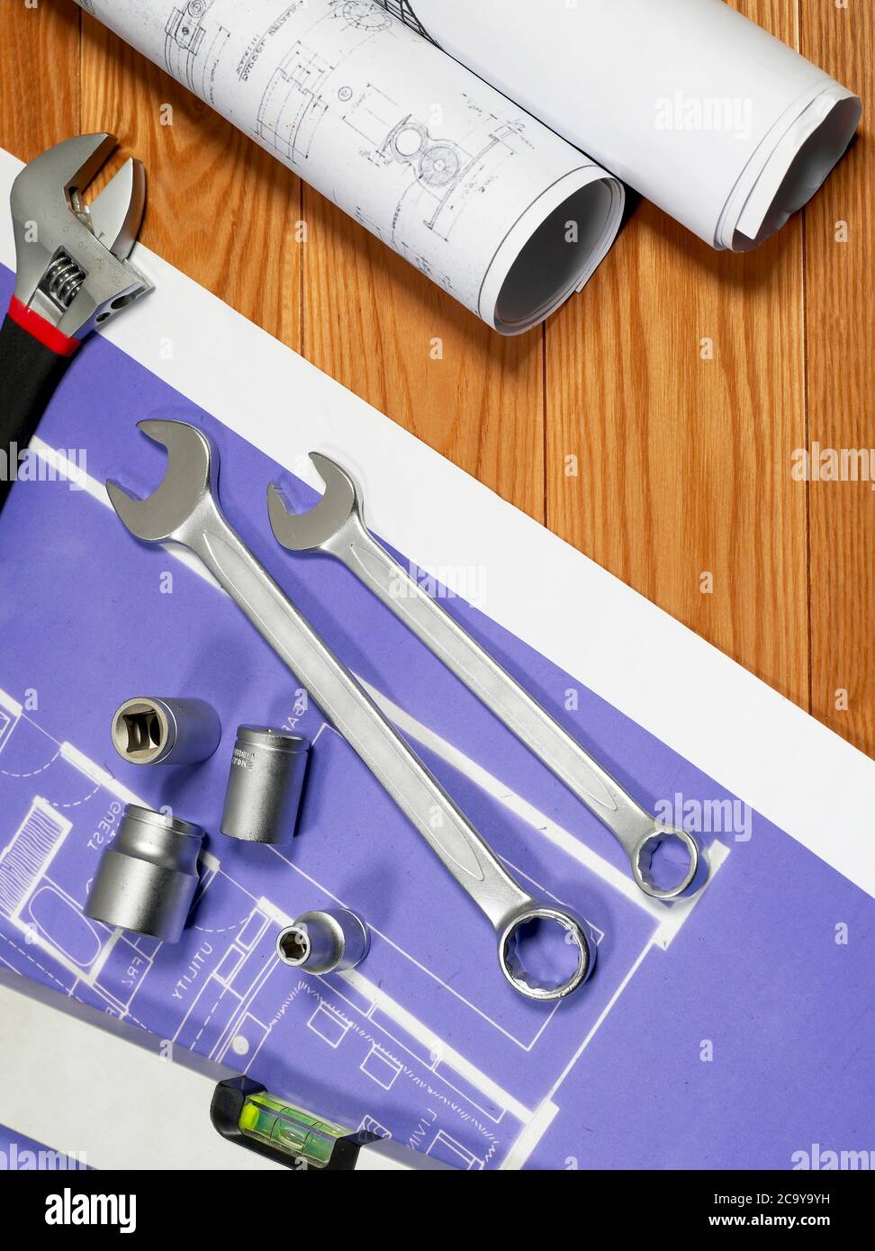 Wrenches and blueprints Stock Photo - Alamy