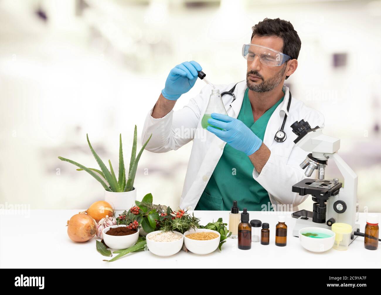 Young male scientist doing experimentation in the laboratory Stock ...