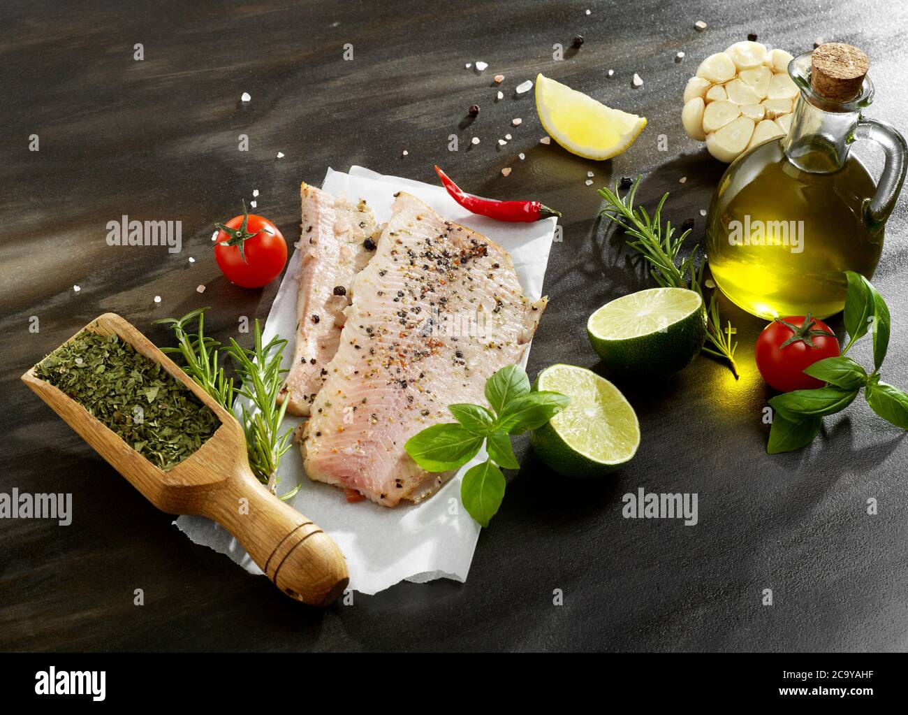 Fish fillet and seasoning Stock Photo - Alamy