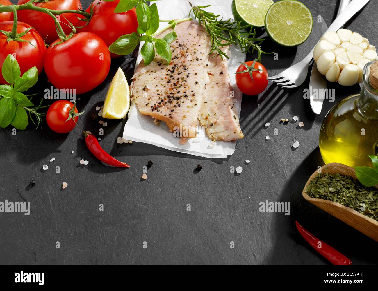 Fish fillet and seasoning Stock Photo - Alamy