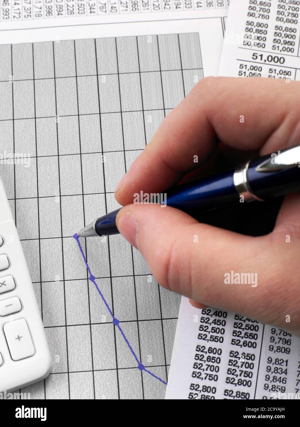 Completing financial papers Stock Photo - Alamy