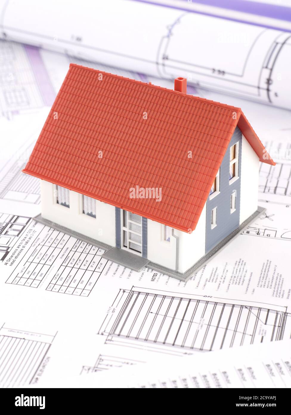 Model house and blueprints Stock Photo - Alamy