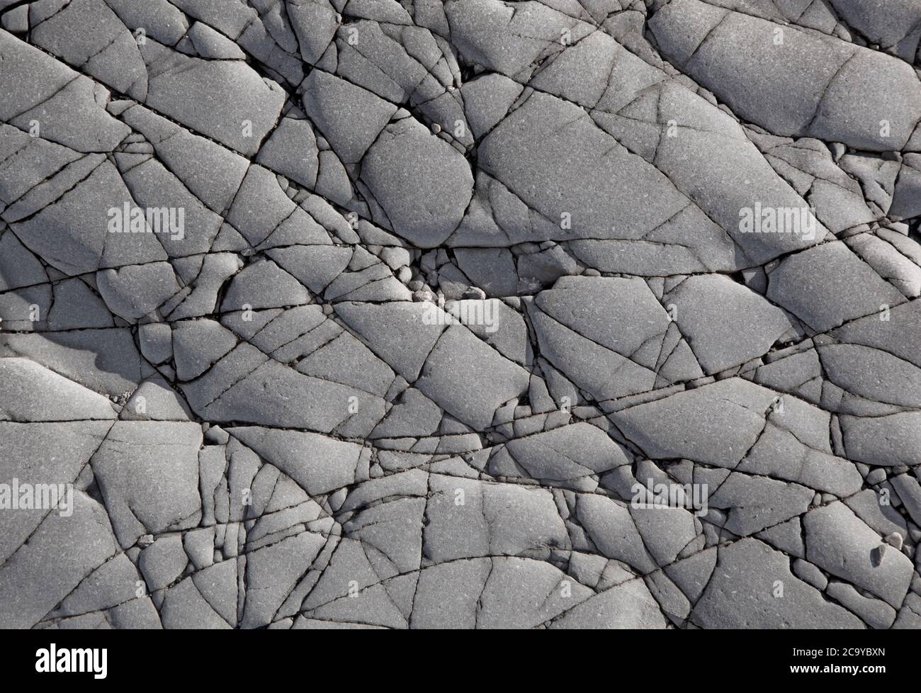 Cracked boulders on the beach near Morwenstow in North Cornwall Stock ...