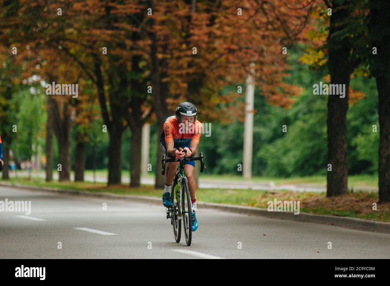KHARKIV, UKRAINE - August 2, 2020: Triathon biking cyclist triathlete ...