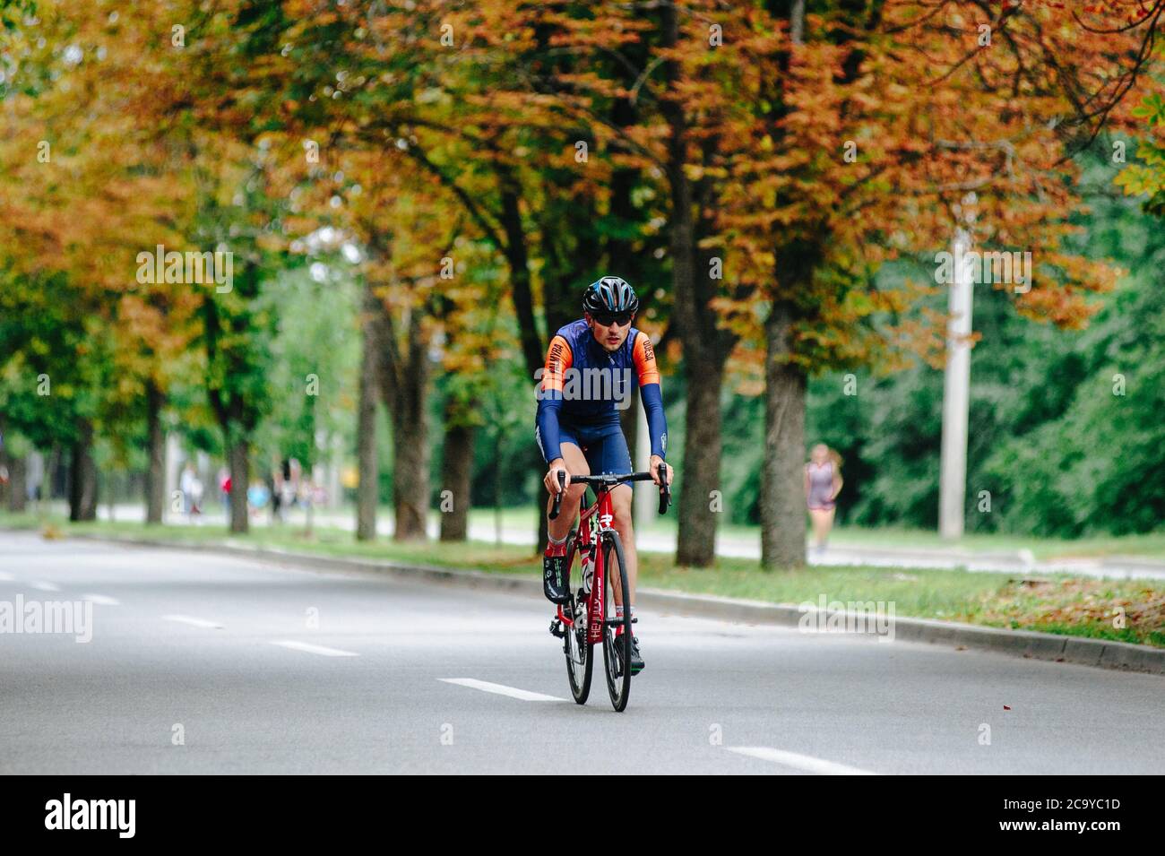 KHARKIV, UKRAINE - August 2, 2020: Triathon biking cyclist triathlete ...