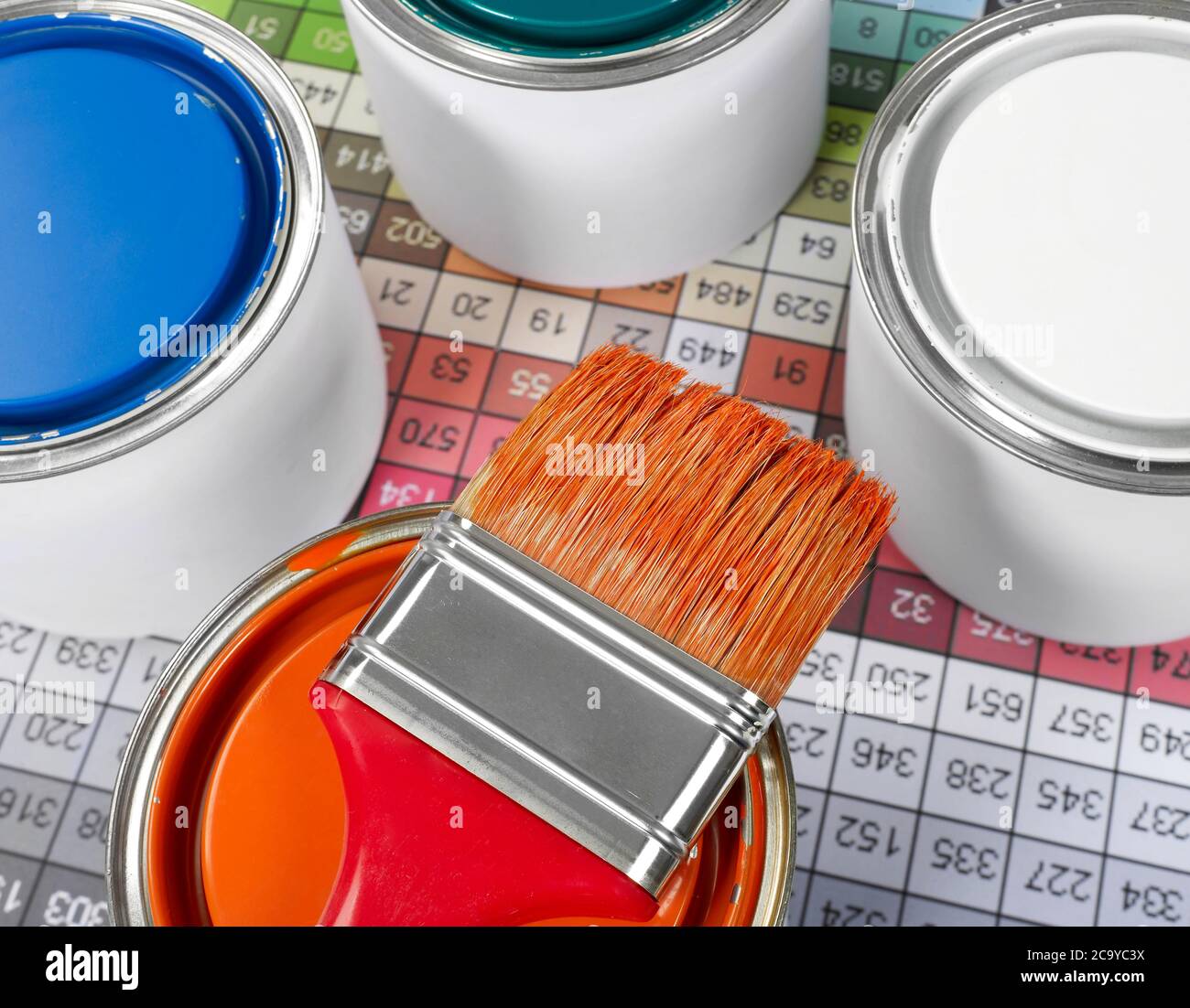 Paint can, paint brush and color swatch Stock Photo - Alamy
