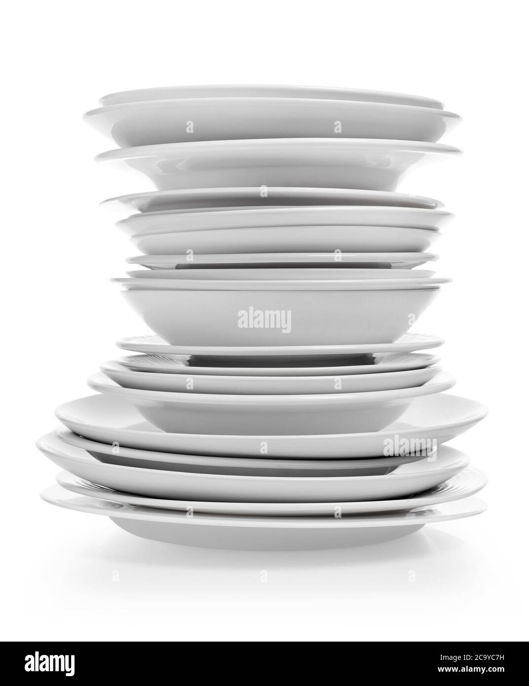 Plates stack isolated on white Stock Photo - Alamy