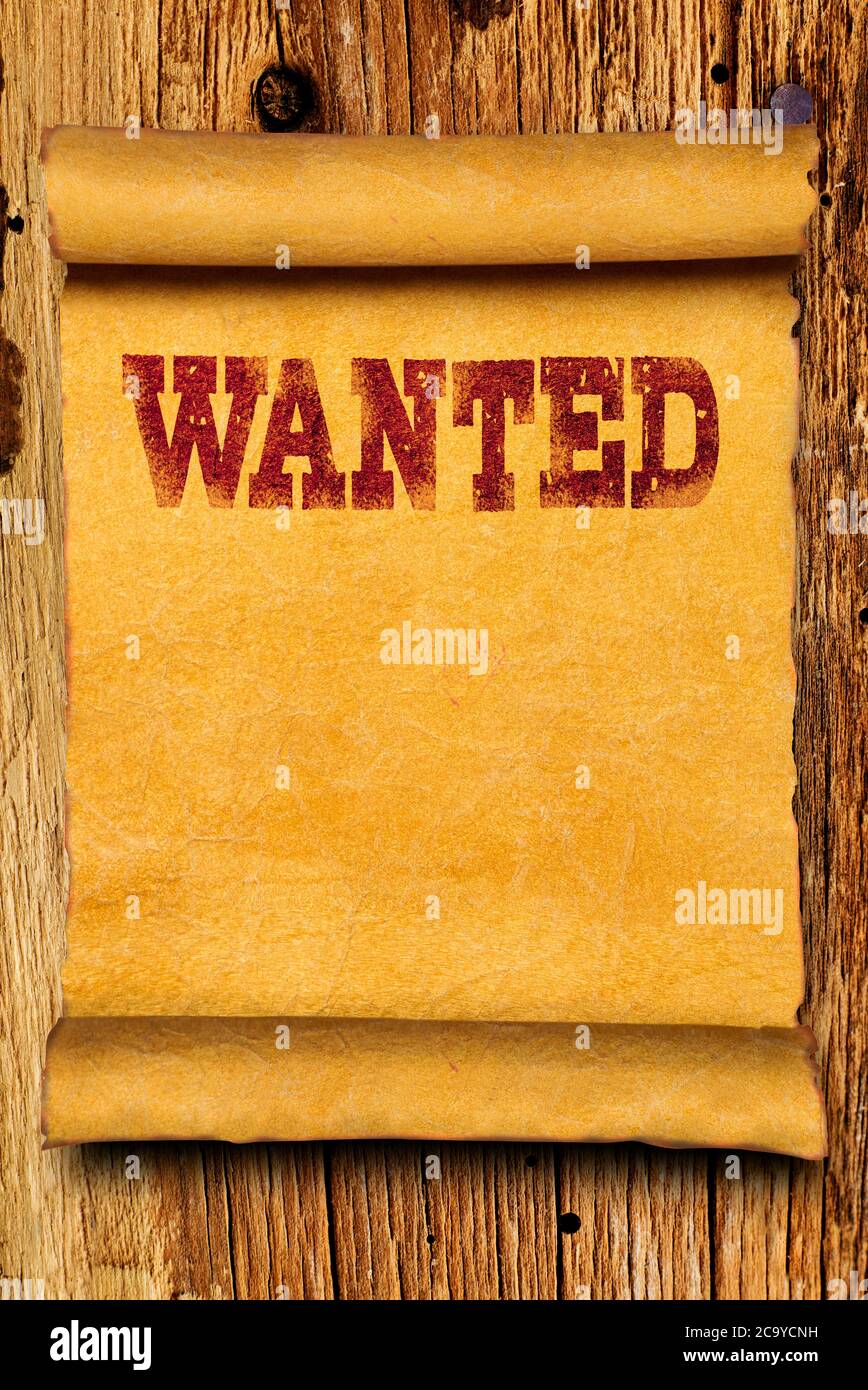 Wanted poster on wood Stock Photo - Alamy