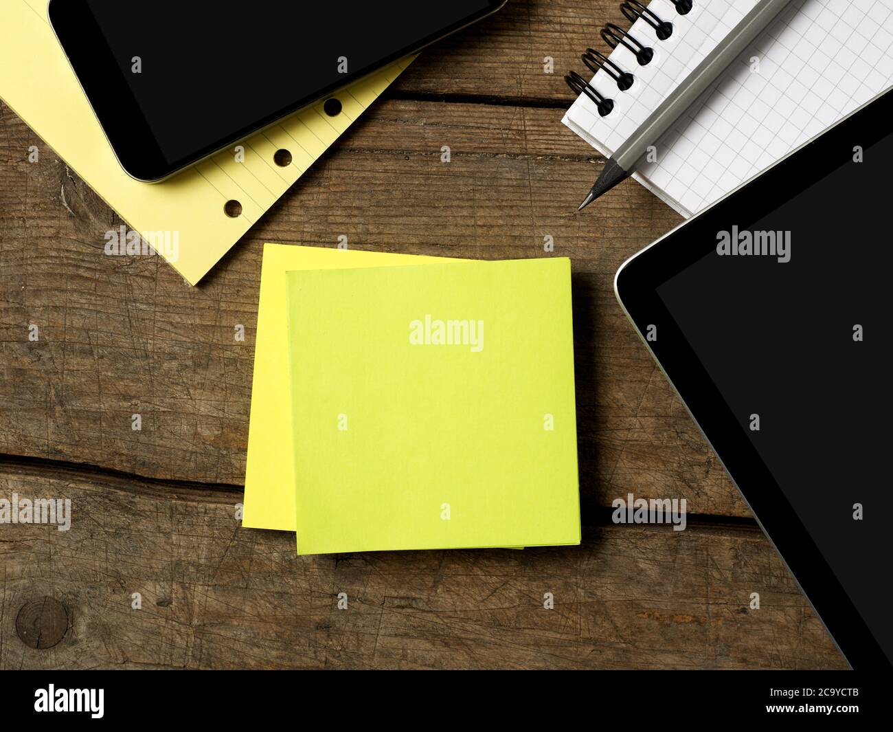 Blank adhesive notes on desk Stock Photo - Alamy