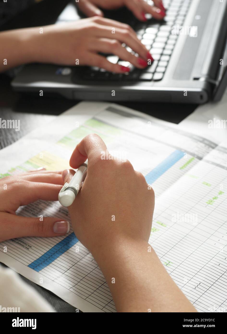 Close-up of people working Stock Photo - Alamy