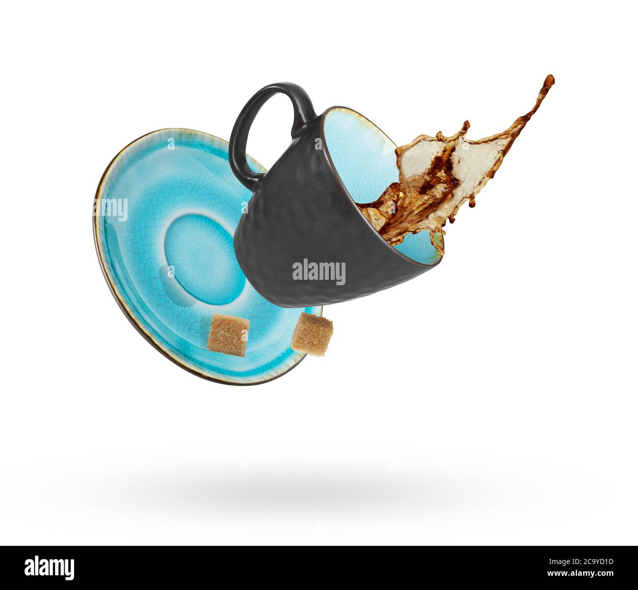 Coffee spilled out of cup Stock Photo - Alamy