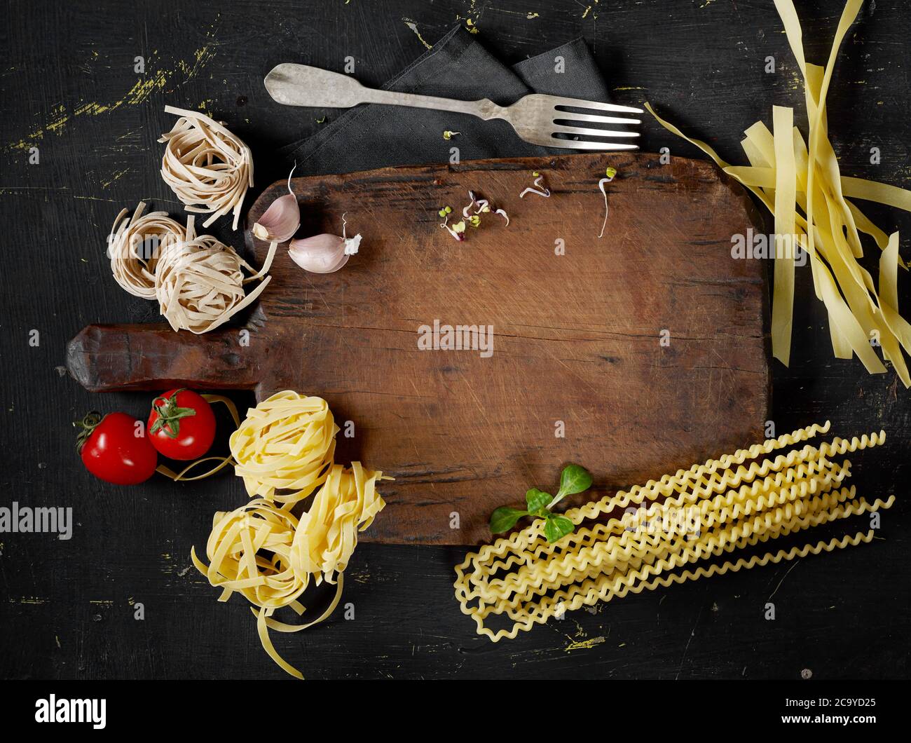 Fresh pasta, ingredients and cutting board Stock Photo - Alamy