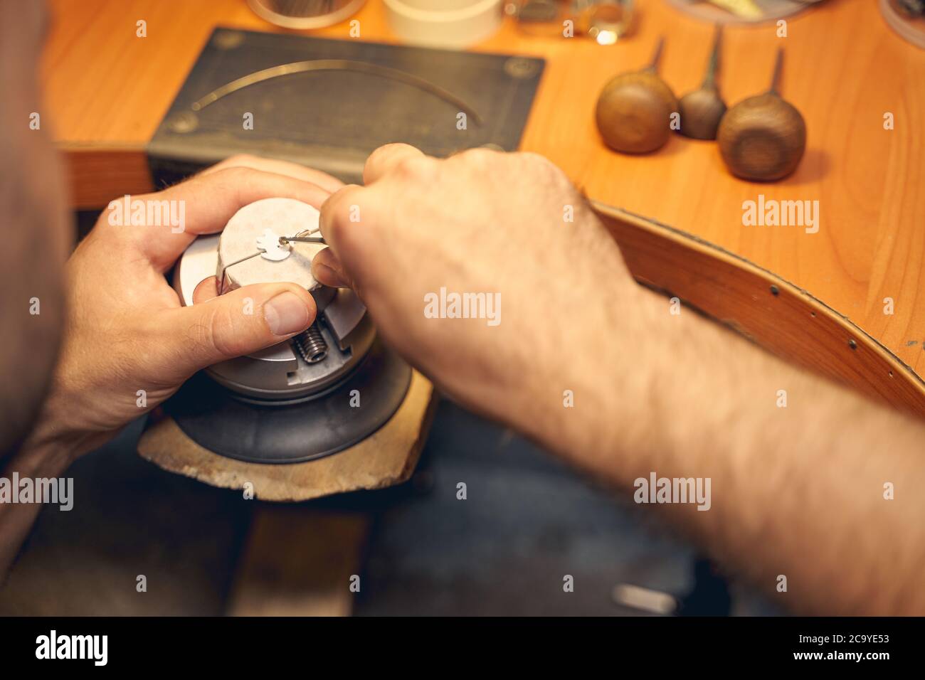Craftsperson using a steel graver in his work Stock Photo - Alamy