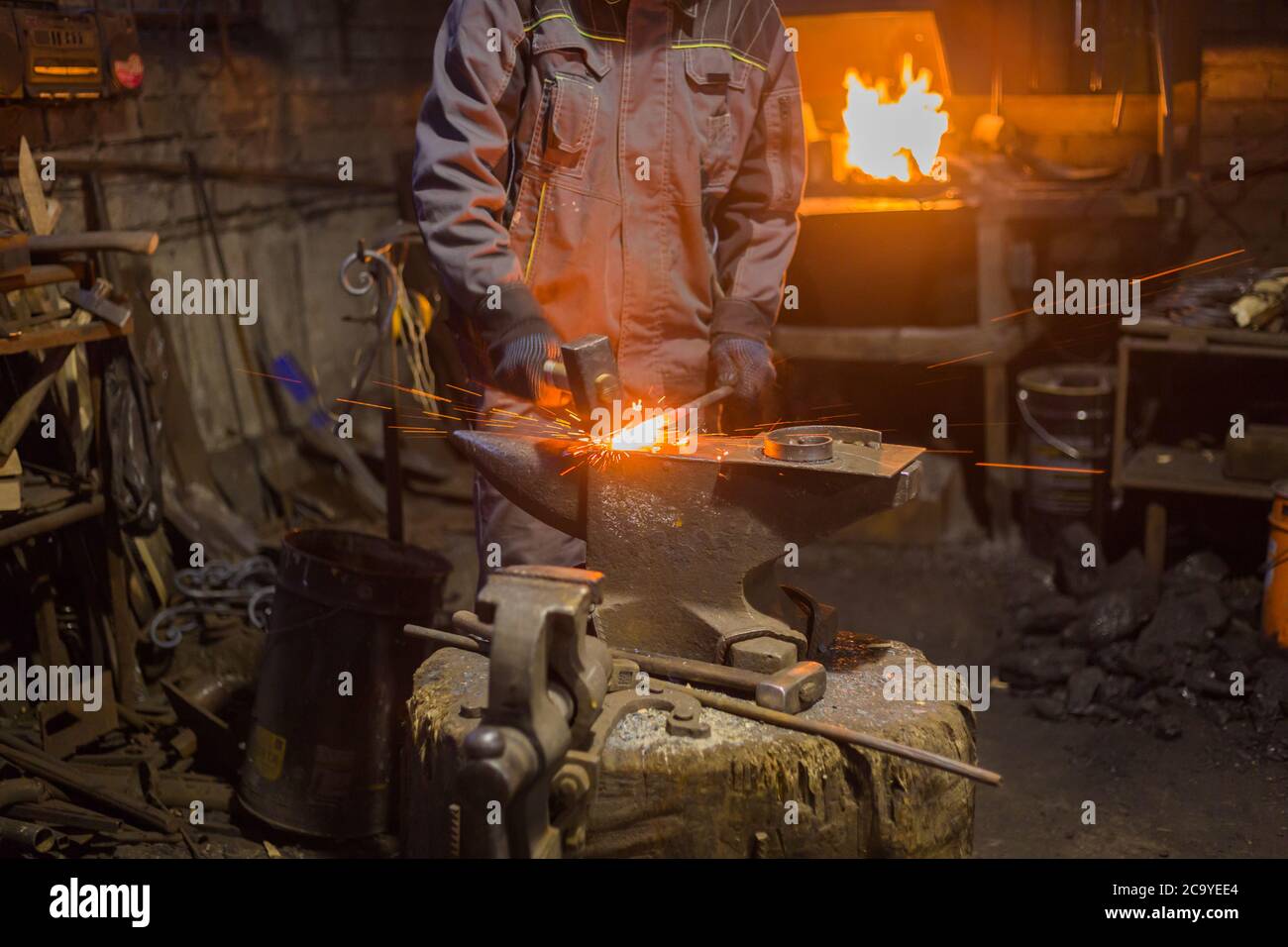 Anvil hammer spark fire hi-res stock photography and images - Alamy