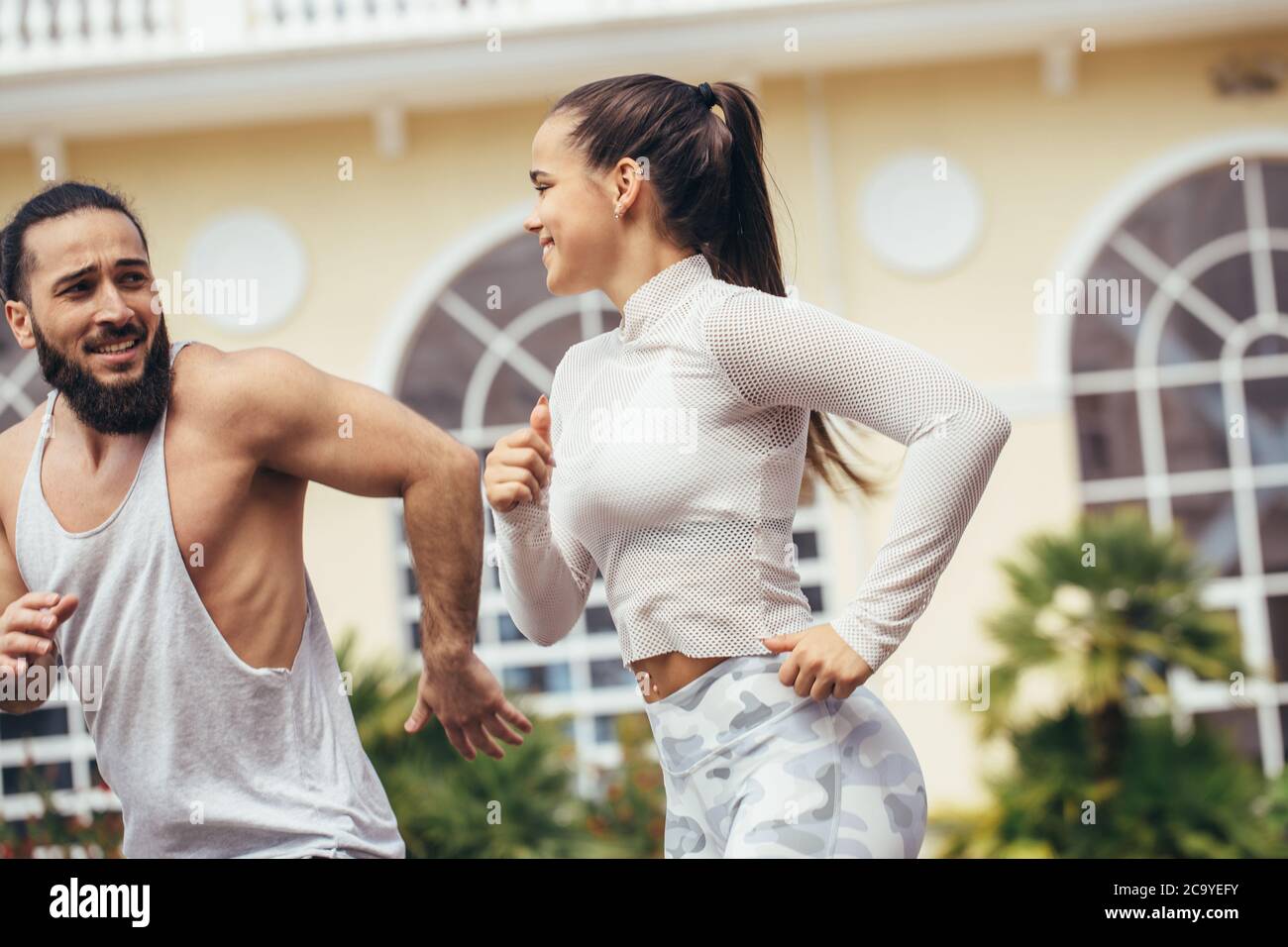 fitness, sport, people and lifestyle concept - happy couple in sport ...