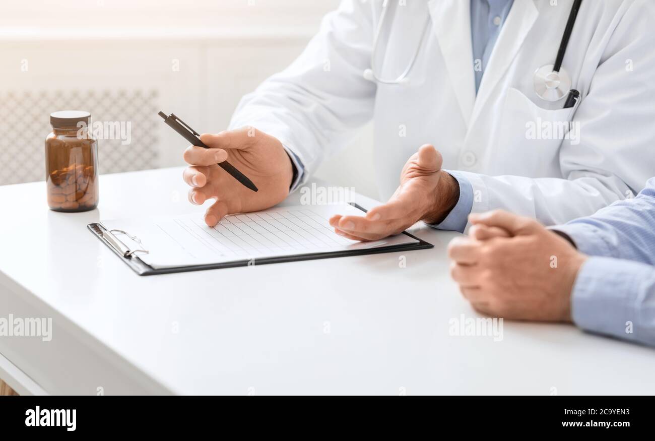 Doctor explaining medical prescription for senior patient Stock Photo ...