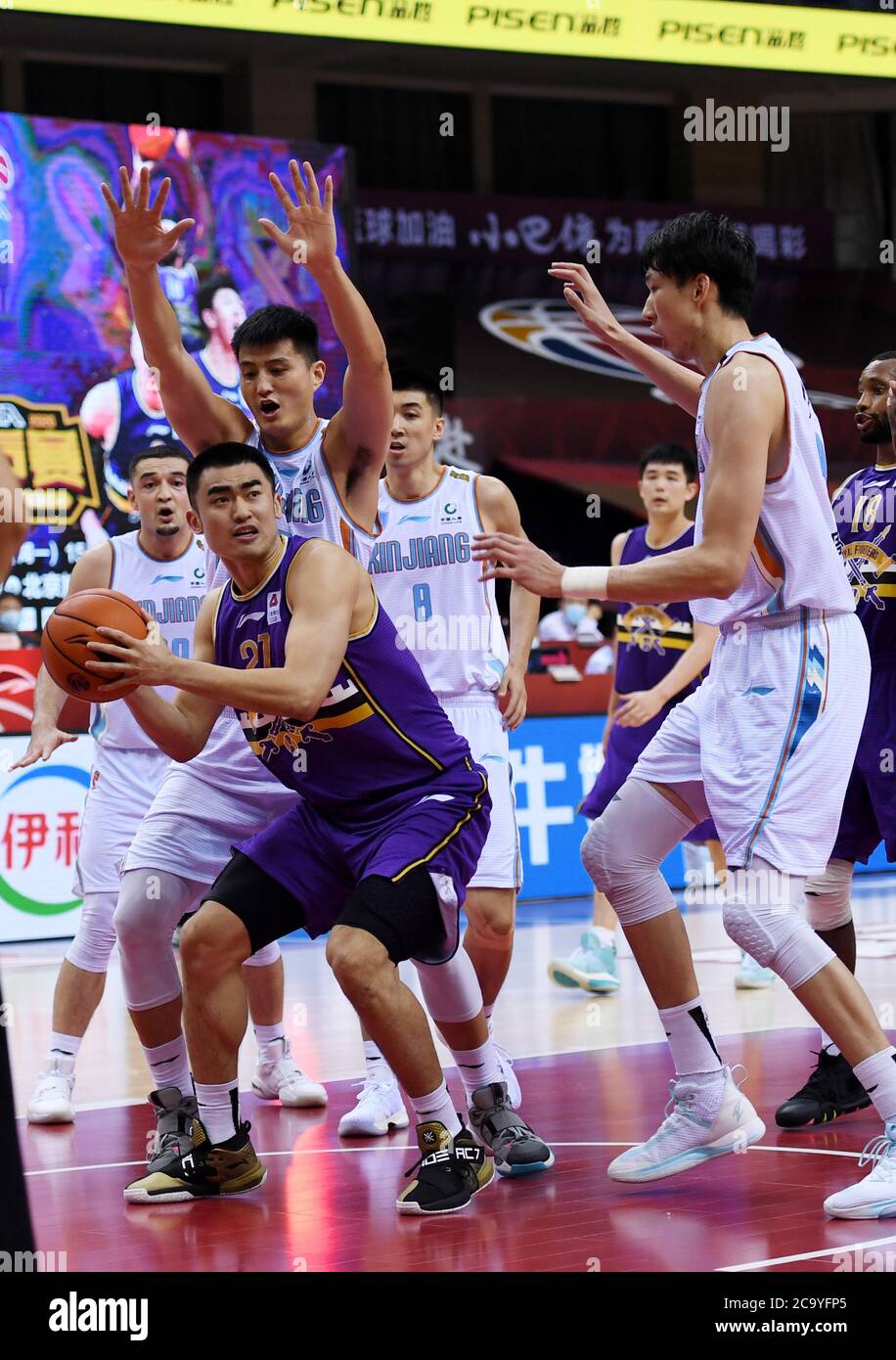 Qingdao, China's Shandong Province. 3rd Aug, 2020. Gao Shang (L, front) of Beijing Royal ...