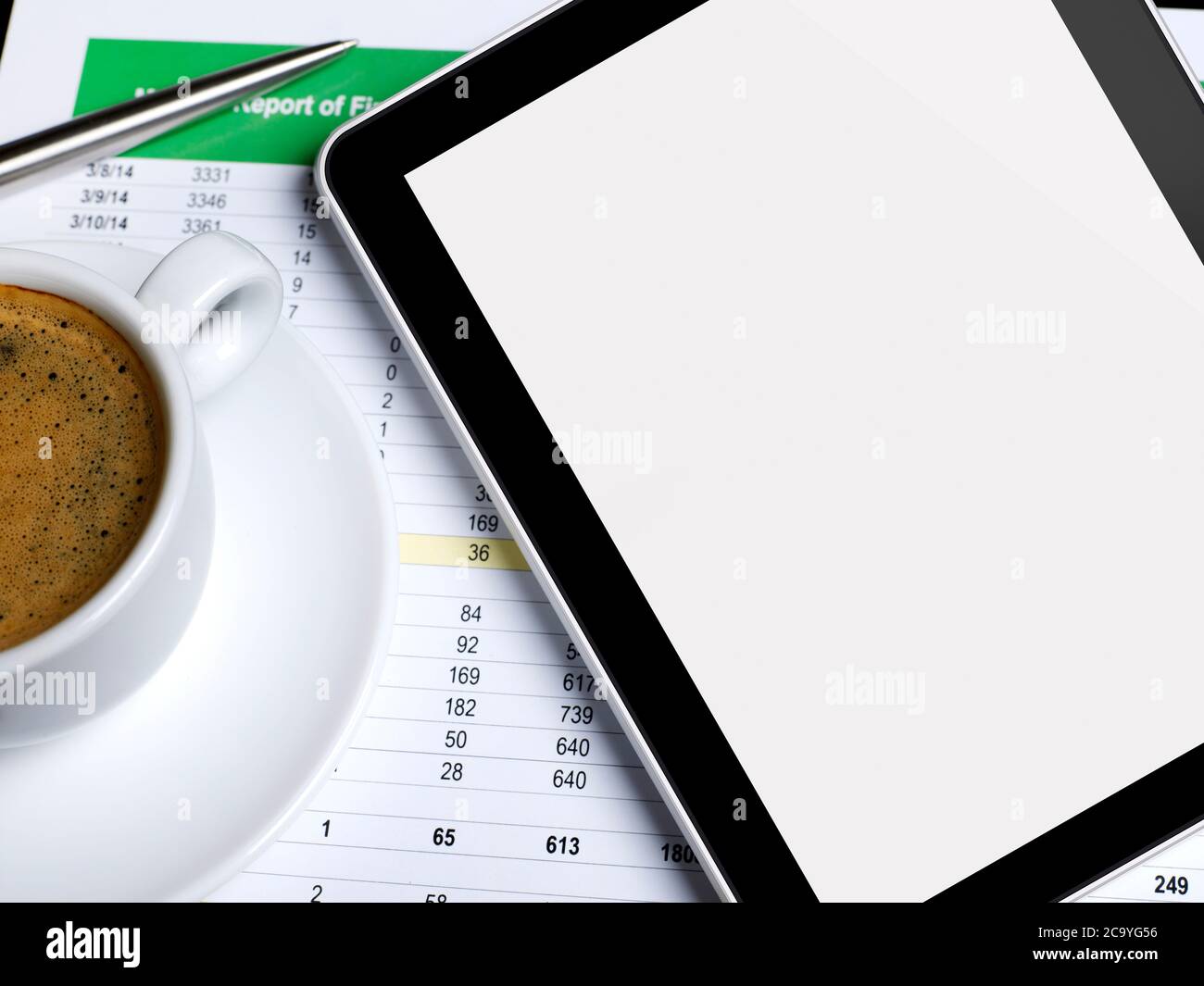 Digital tablet on desk Stock Photo - Alamy