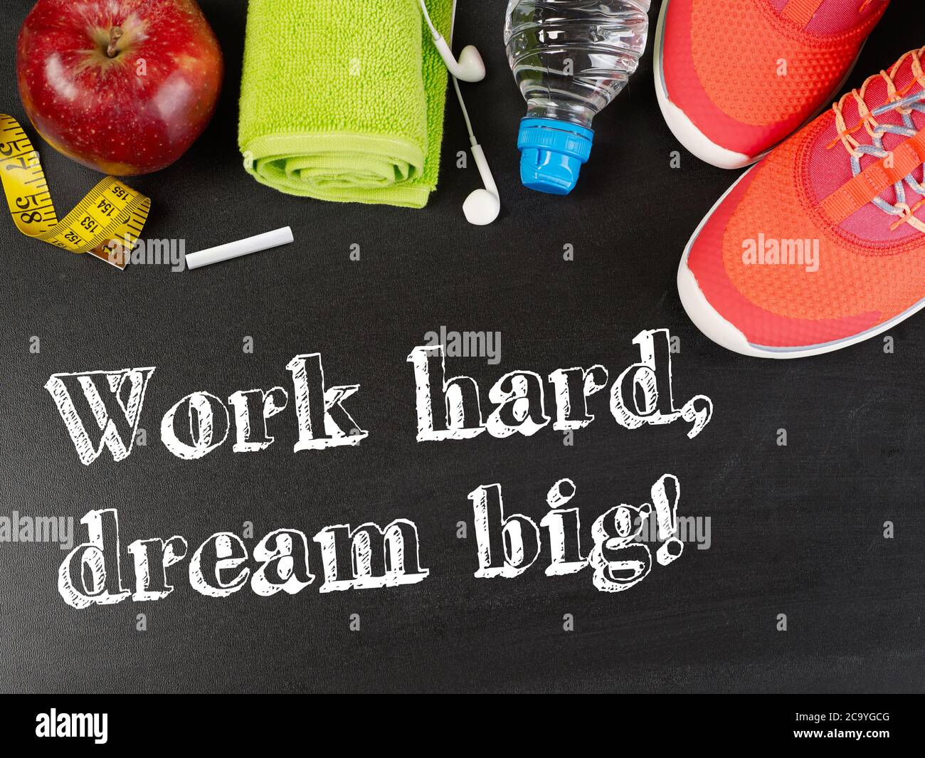 Sport equipment and motivational message on a blackboard Stock Photo ...