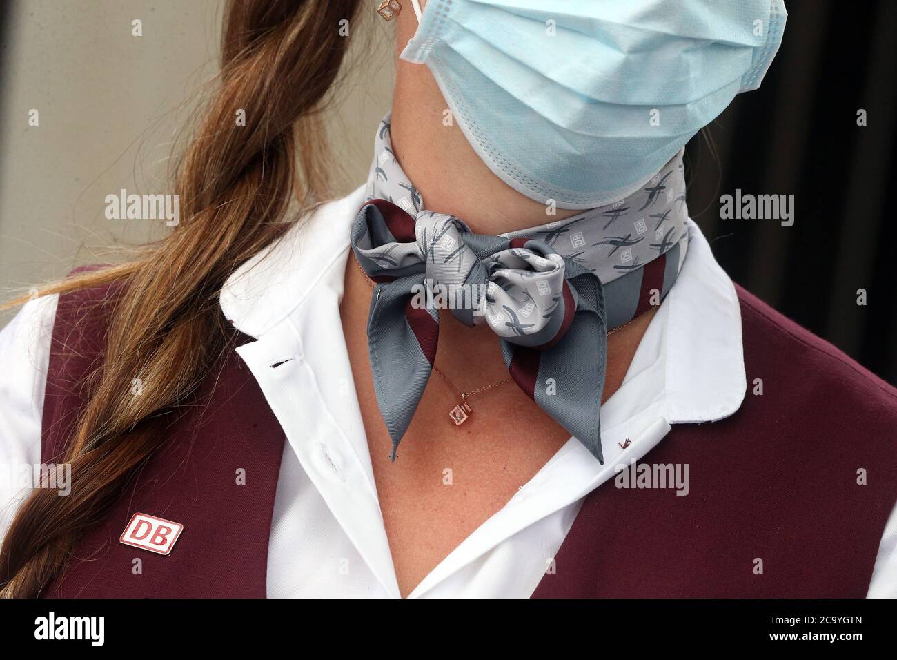 Berlin, Germany. 03rd Aug, 2020. A Deutsche Bahn employee attends a ...